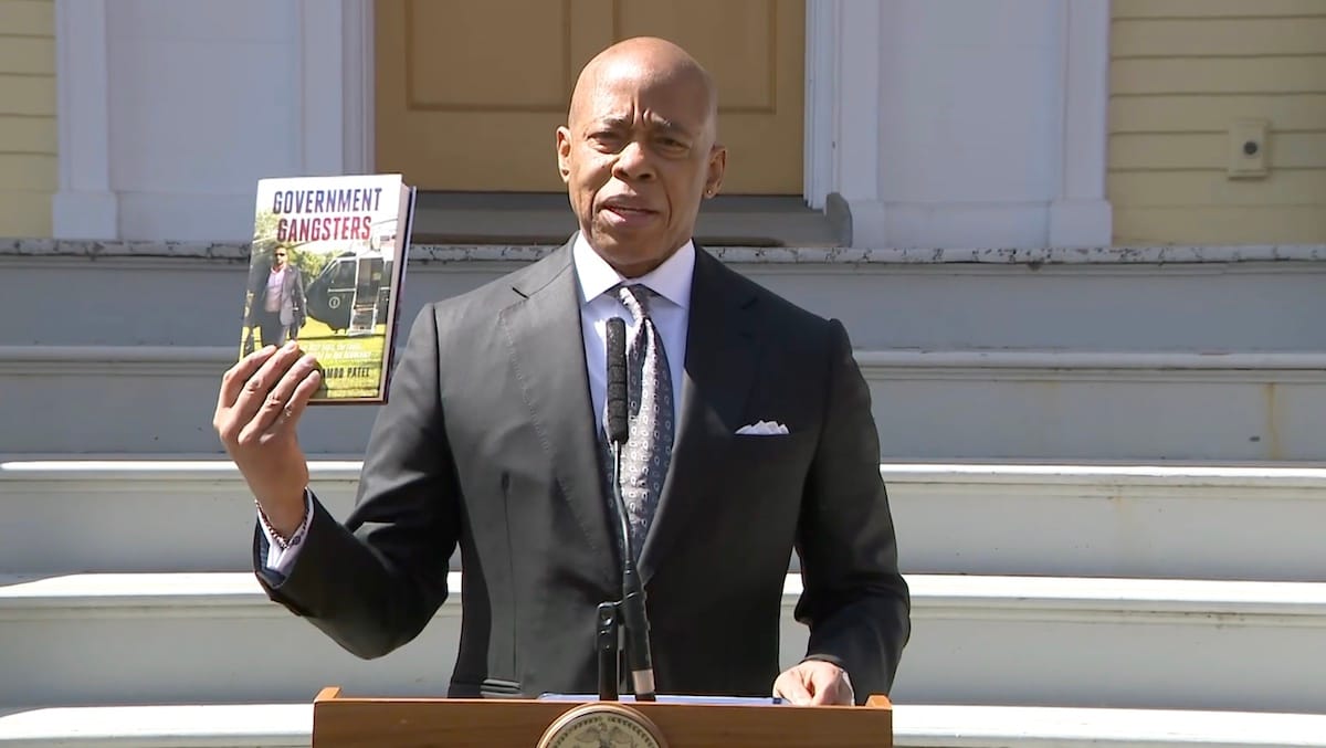 Charges Dismissed, Mayor Adams Hawks MAGA Book